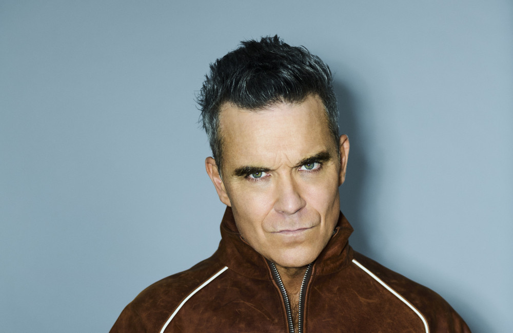 Robbie Williams surprise releases BRITPOP album three…
